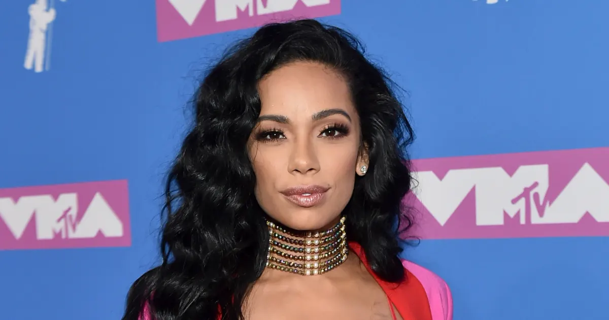 Erica Mena Puts Her Chest On Display In Cut-Out Dress