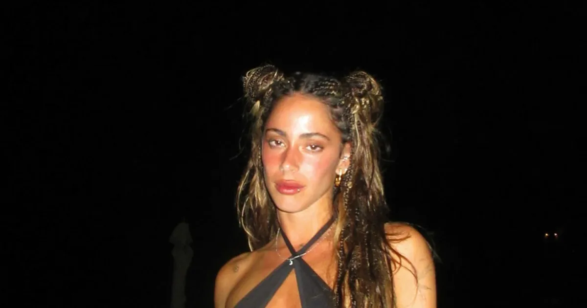 Singer Tini In A Mini Jumpsuit: Is That Still Clothing?