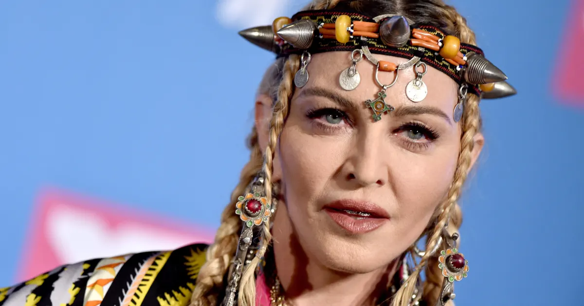 Madonna's On-Stage Oops! She Takes a Tumble But Laughs it Off!