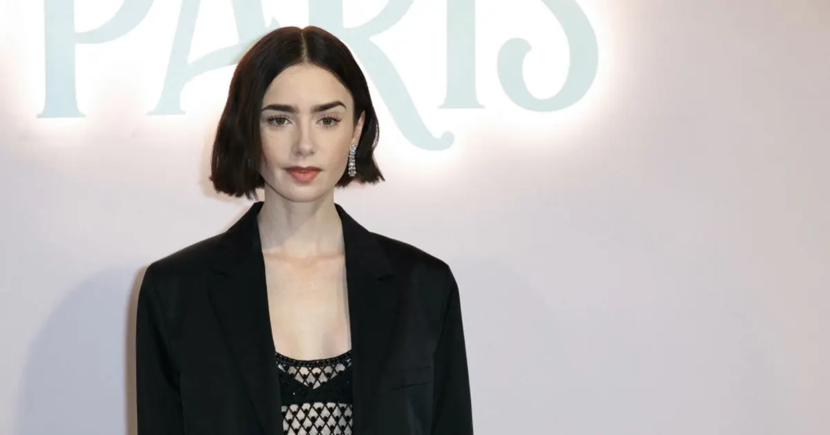 Hot & Chic: Lily Collins Shows Off Lots Of Skin In Black Dress